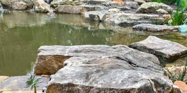 Natural-Rock-Diving-Platform-in-Recreational-Swimming-Pond | Atlantic Ponds